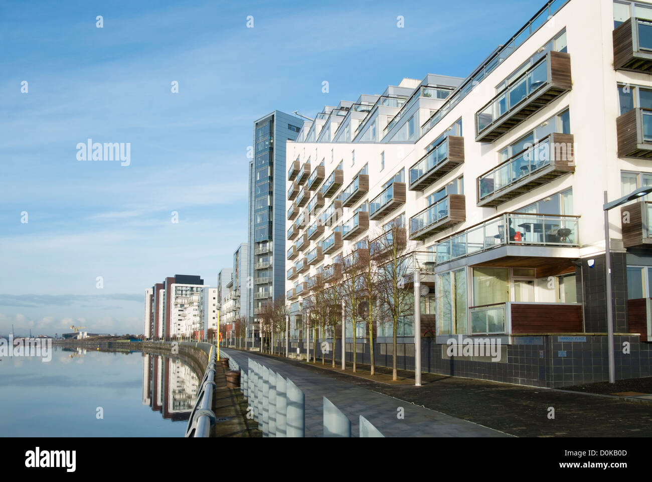 Modern high-rise apartment buildings on River Clyde at Glasgow Harbour ...