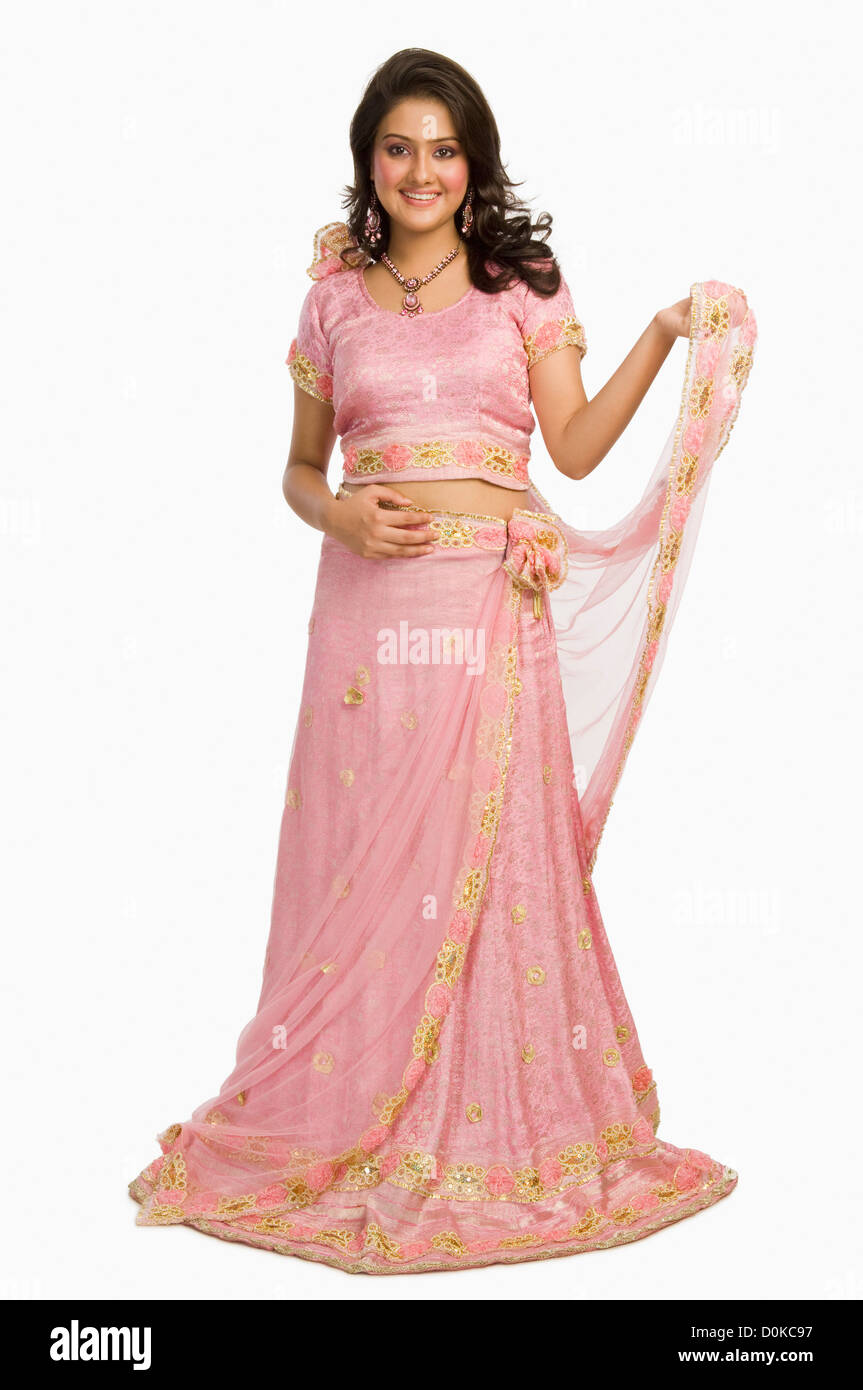 Portrait of a beautiful woman posing in traditional dress Stock Photo ...