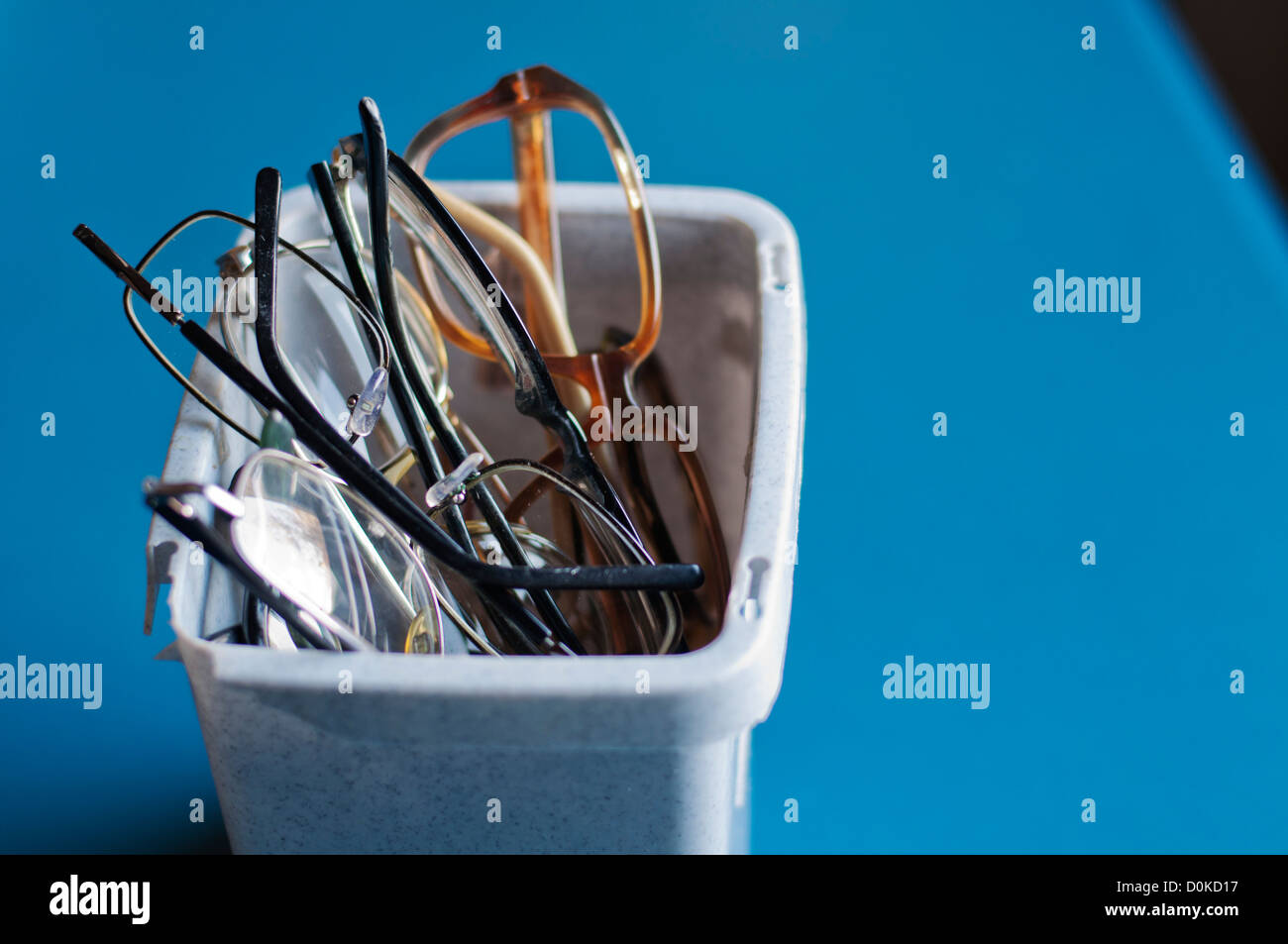 Old glasses in trash Stock Photo - Alamy