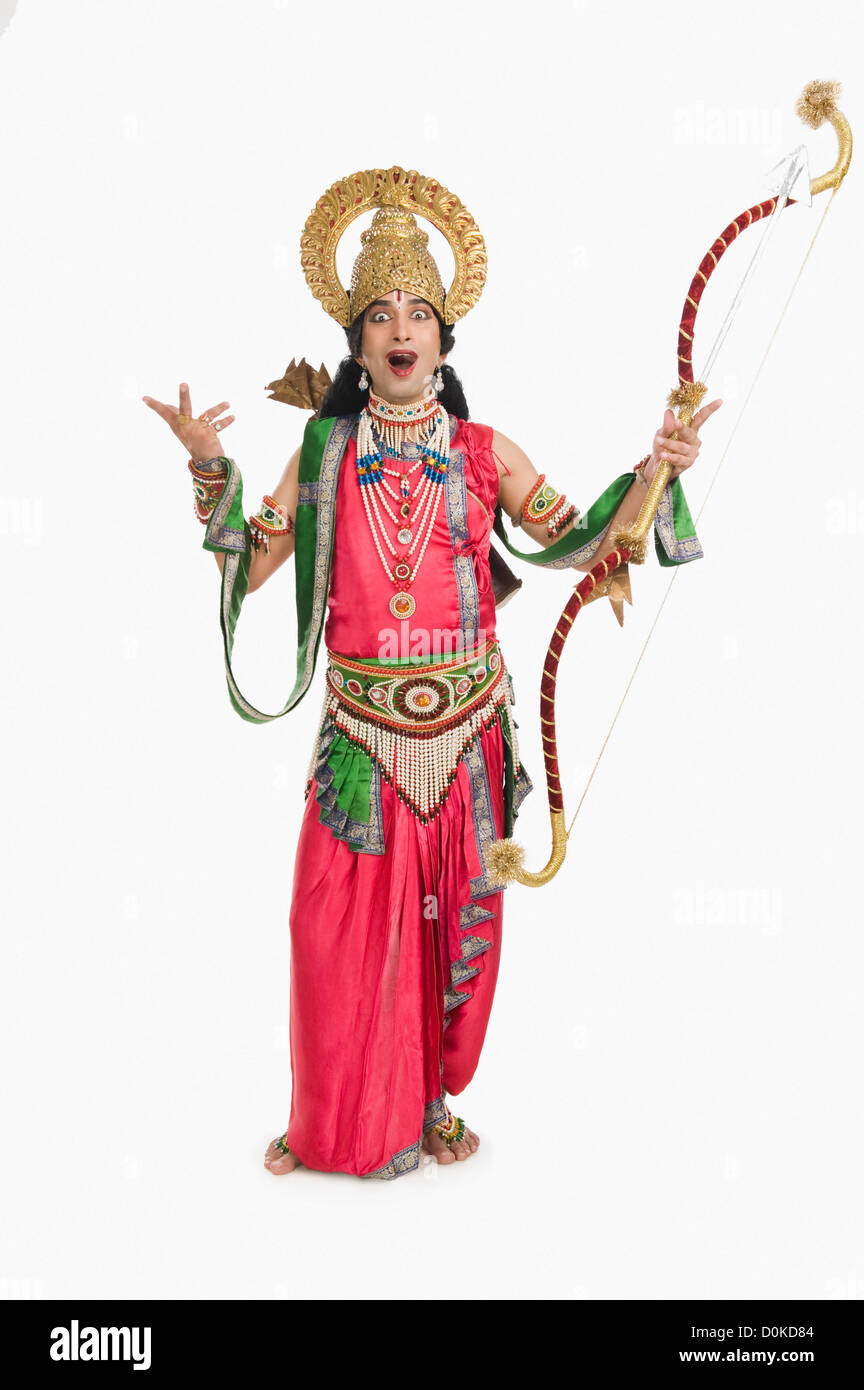 Portrait of a stage artist dressed-up as Rama the Hindu mythological ...
