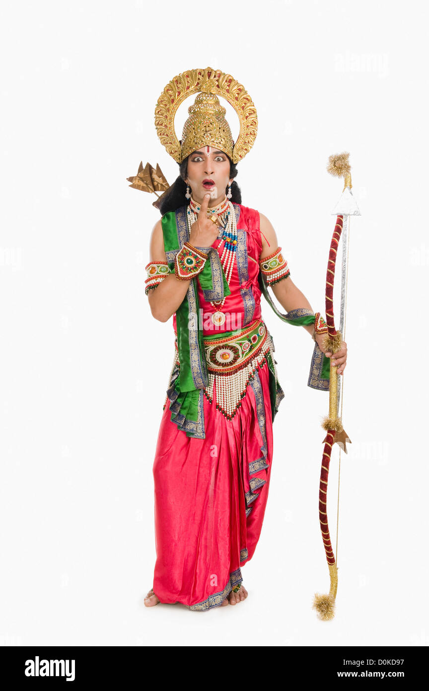Portrait of a stage artist dressed-up as Rama the Hindu mythological ...