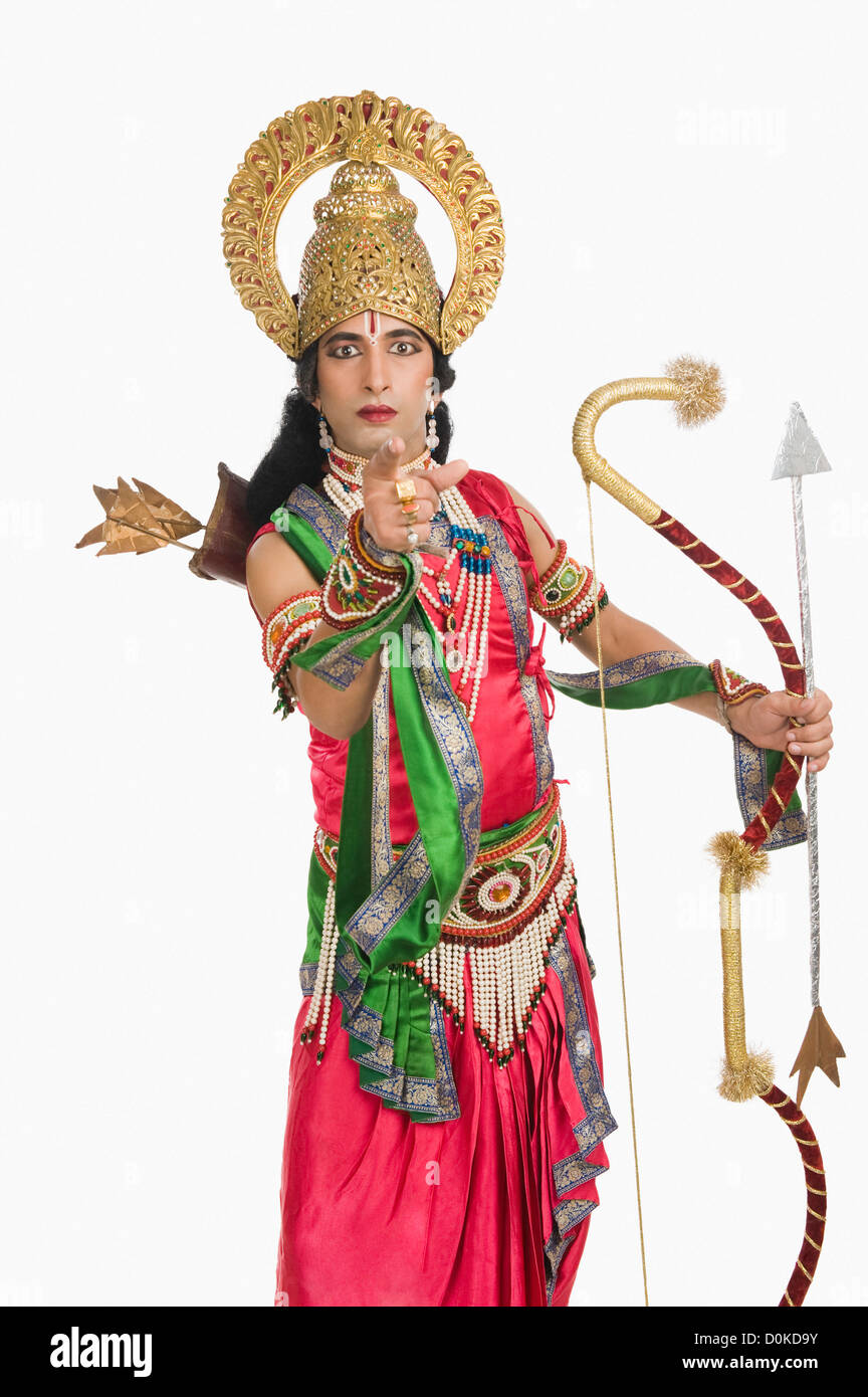 Portrait of a stage artist dressed-up as Rama the Hindu mythological ...