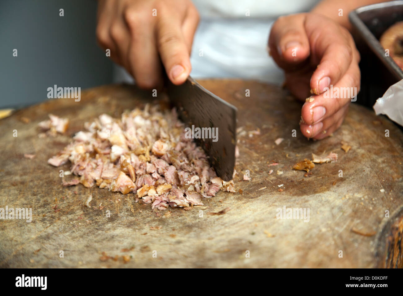 Man chopping meat at meat market hi-res stock photography and images ...