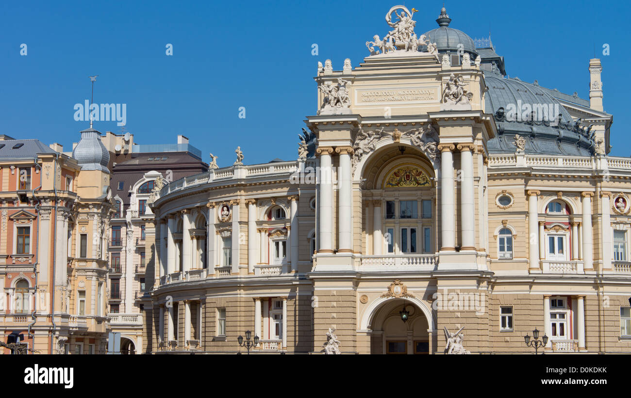 Ornate facade of historical curved building with sculptures, domed roof ...