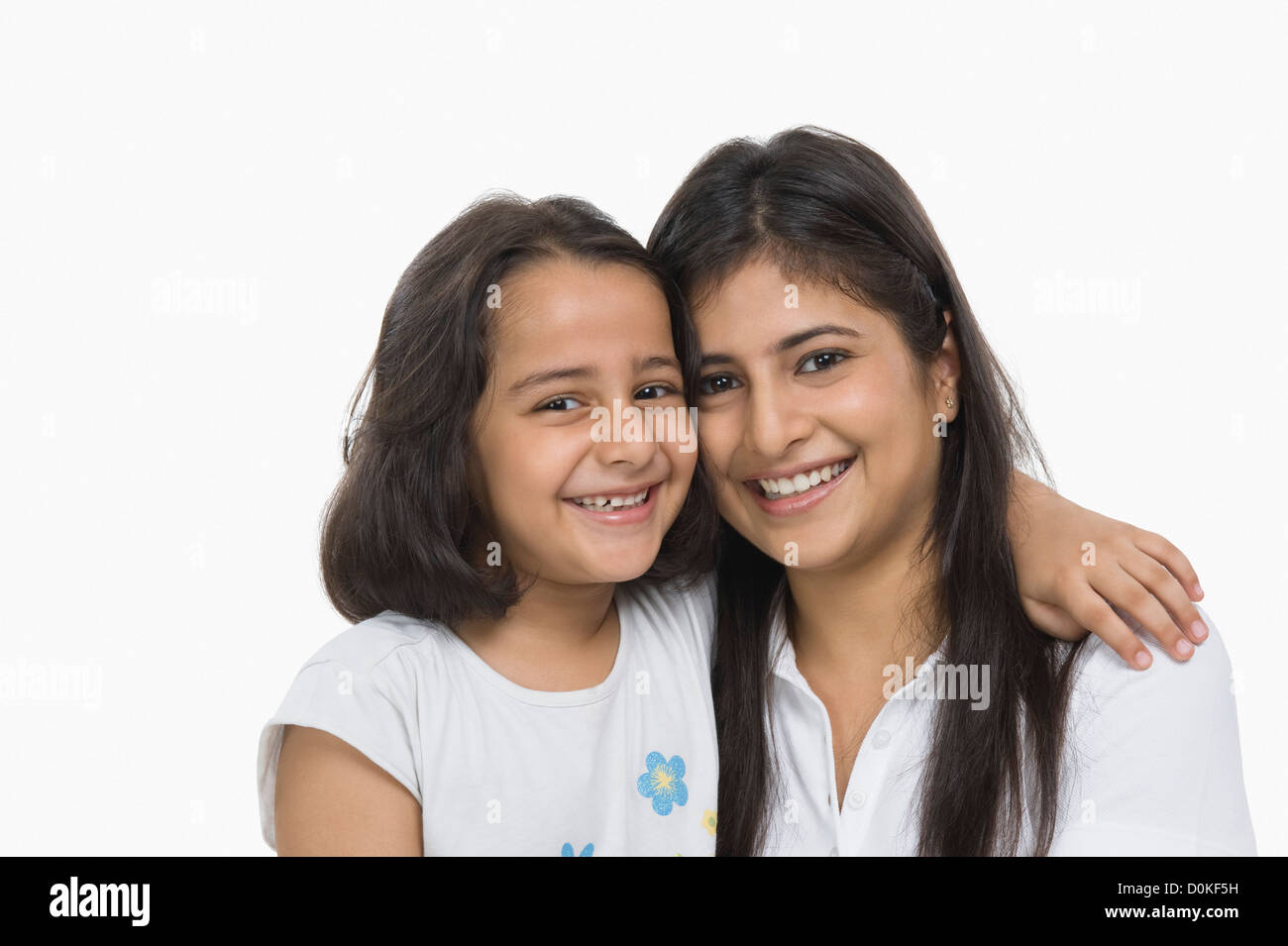 Portrait of a woman smiling with her daughter Stock Photo - Alamy