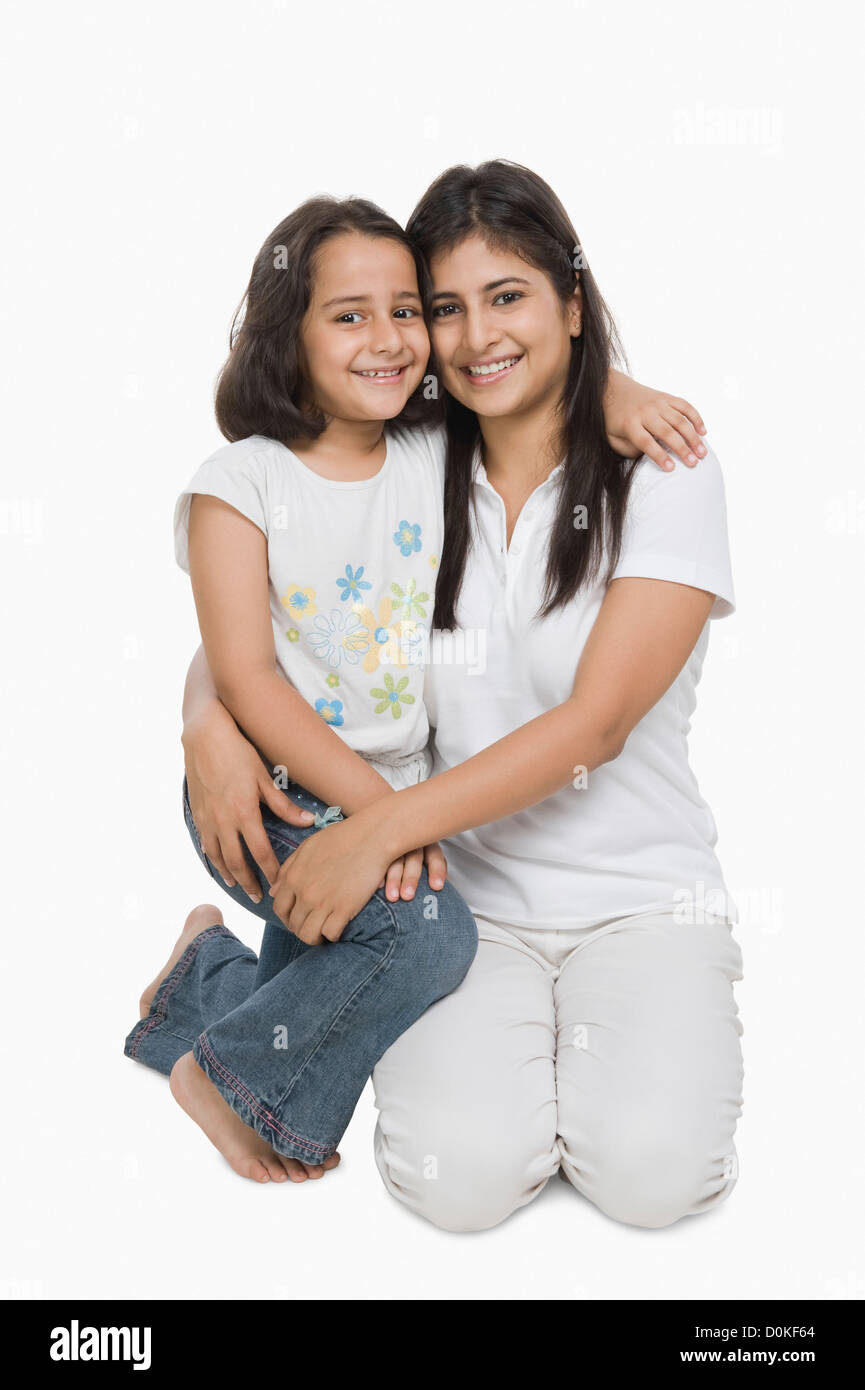 Portrait of a woman smiling with her daughter Stock Photo - Alamy