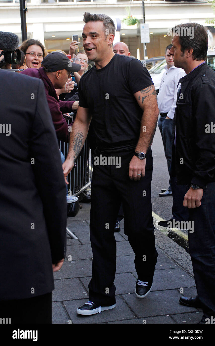 Robbie Williams arrives at the BBC Radio One Studios London, England ...