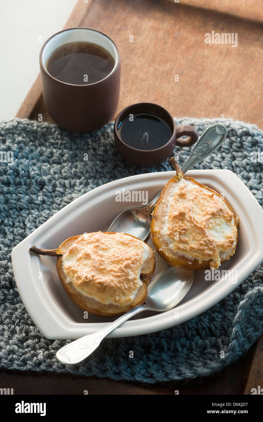 Pears with coconut meringues Stock Photo - Alamy