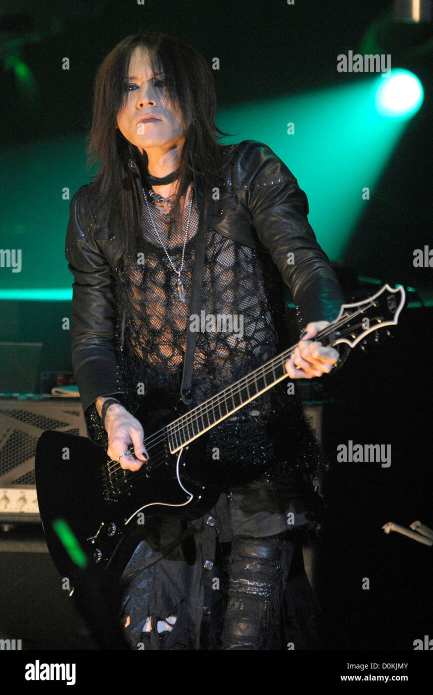 Yune 'Sugizo' Sugihara of 'X Japan' performing on stage at Massey Hall. Toronto, Canada - 07.10. ...
