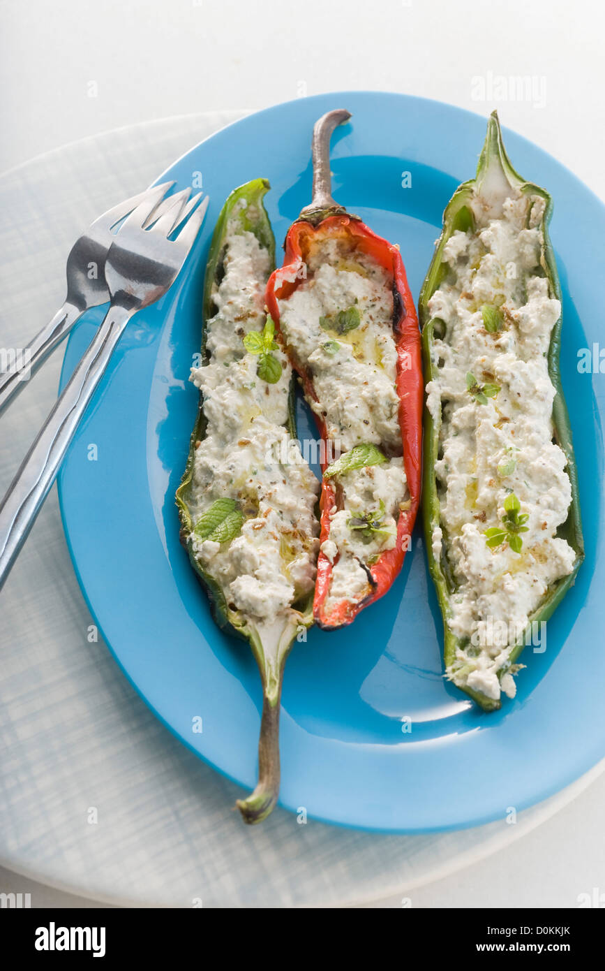 Pimientos stuffed with tofu and garden herbs Stock Photo - Alamy