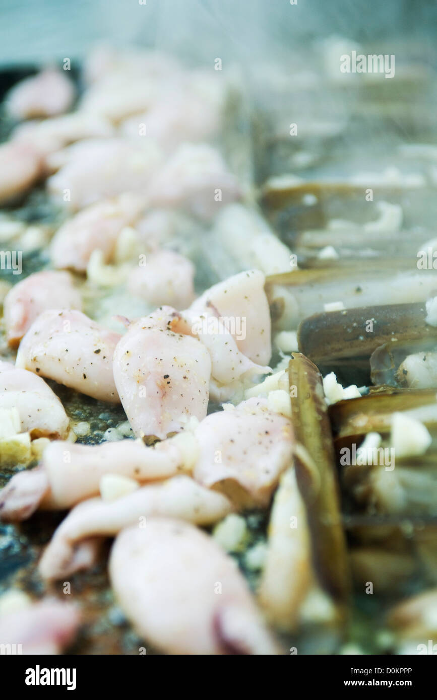 Razor shells and calamari grilled barbecue, closeup Stock Photo - Alamy
