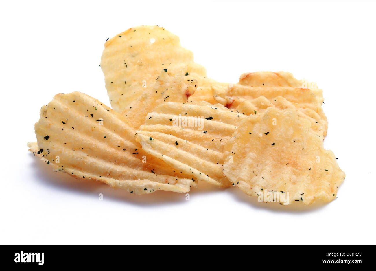 Couple of golden chips with greens isolated on white Stock Photo - Alamy