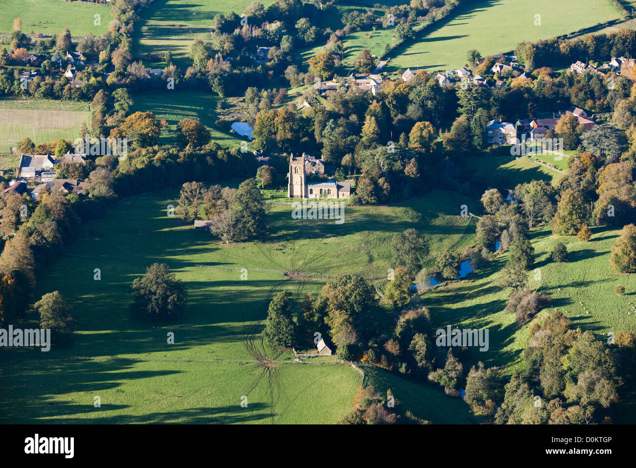 An aerial view of the Cotswold village of Temple Guiting ...