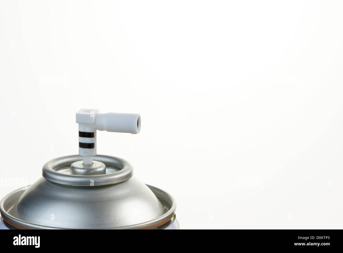 Close up of the top of an aerosol can showing the spray nozzle. 36 mp ...
