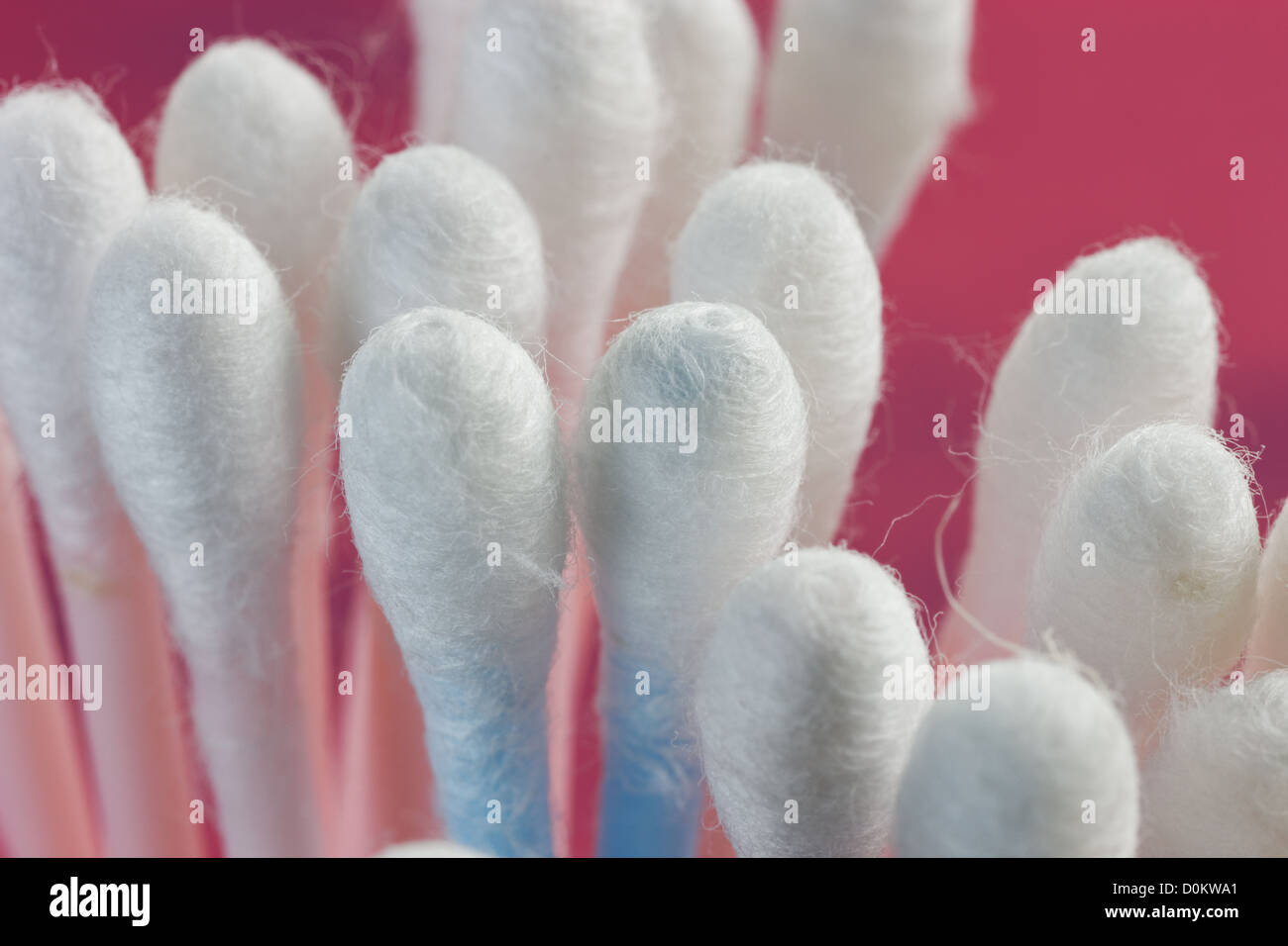 Close up of a group of cotton bud swabs. Focus concentrated on one bud ...