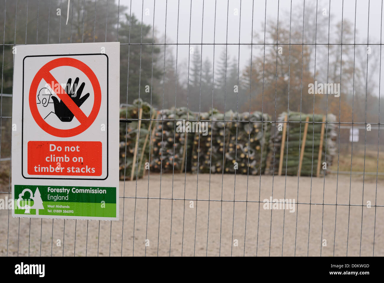 do not climb on timber stacks warning sign Stock Photo - Alamy