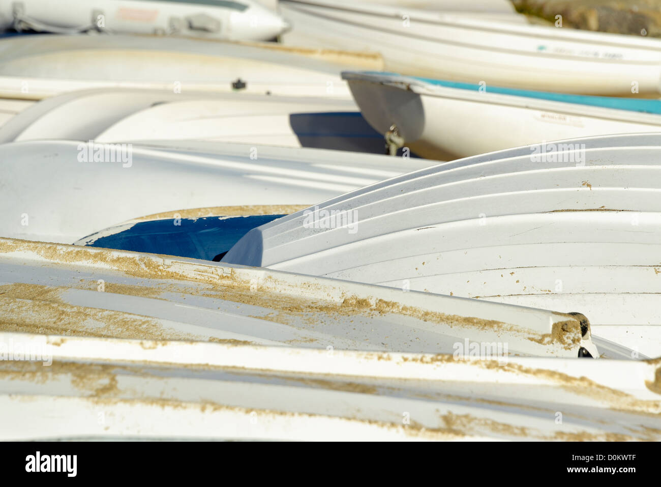 Overturned rowboats on the beach Stock Photo - Alamy