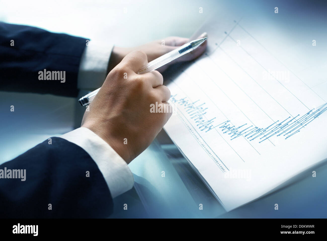 read the graph in financial report Stock Photo - Alamy