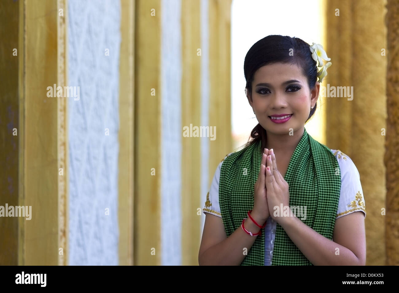 Asian Girl Greets in temple traditional way with both hands Stock Photo ...
