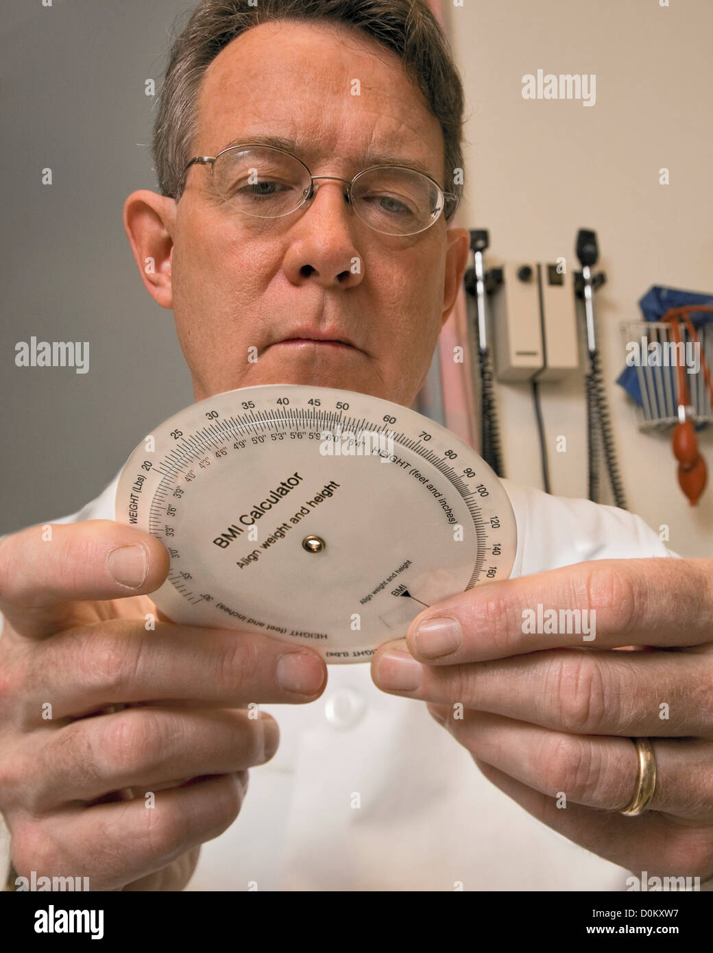 Doctor with Body-Mass Index Wheel Stock Photo - Alamy