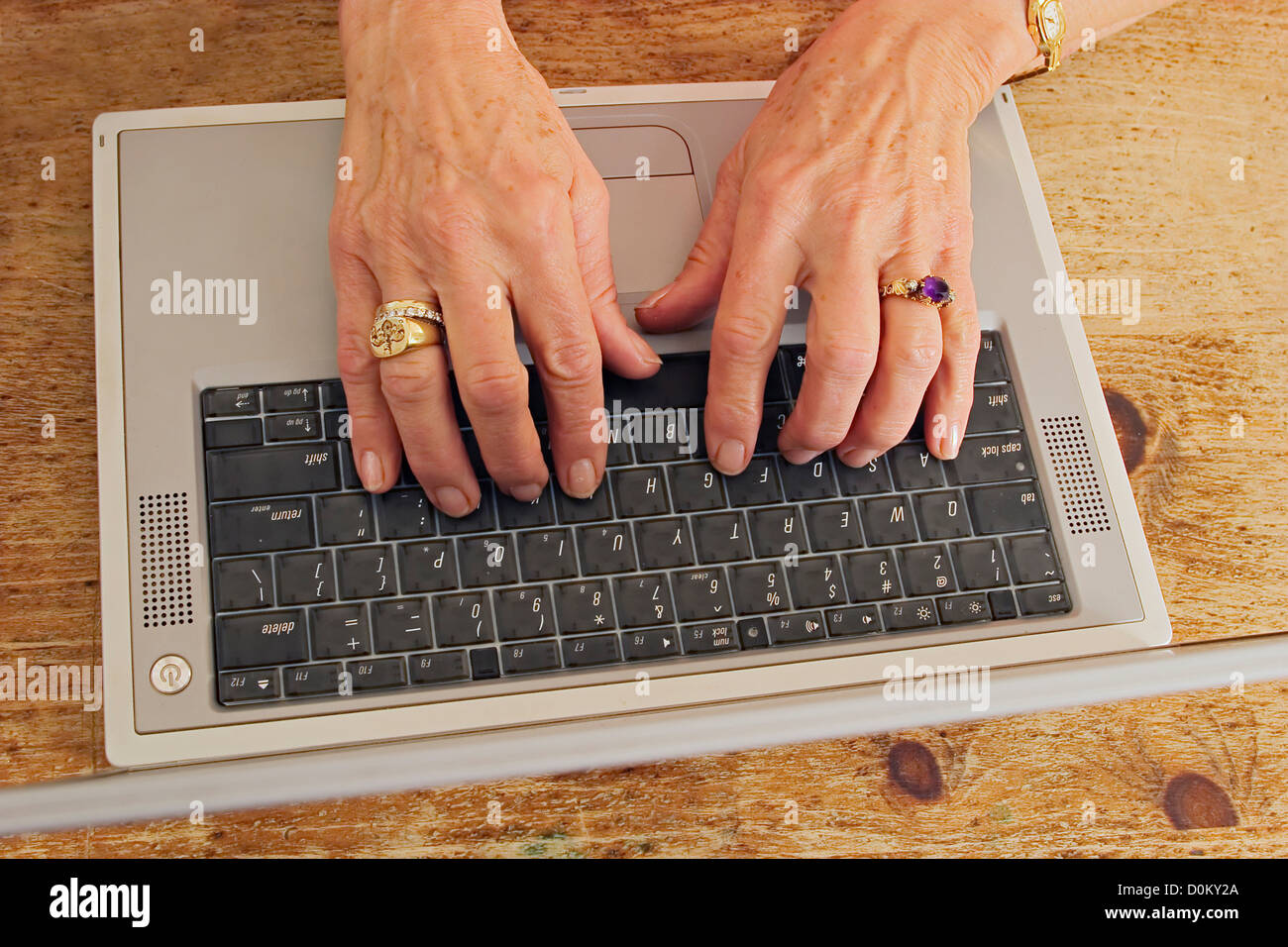 Typing on a Laptop Stock Photo - Alamy