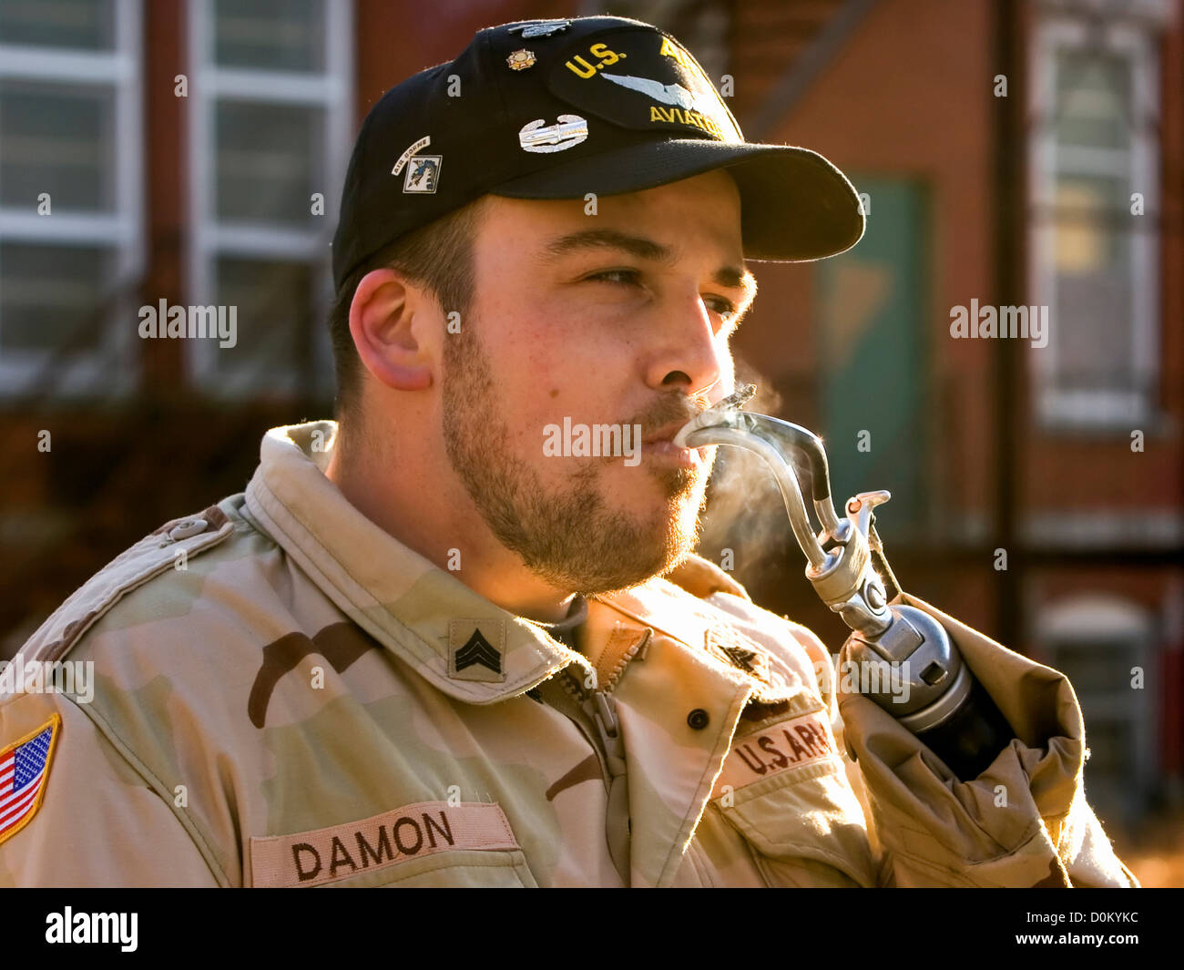 Young Veteran Smoking with Prosthetic Limb Stock Photo - Alamy