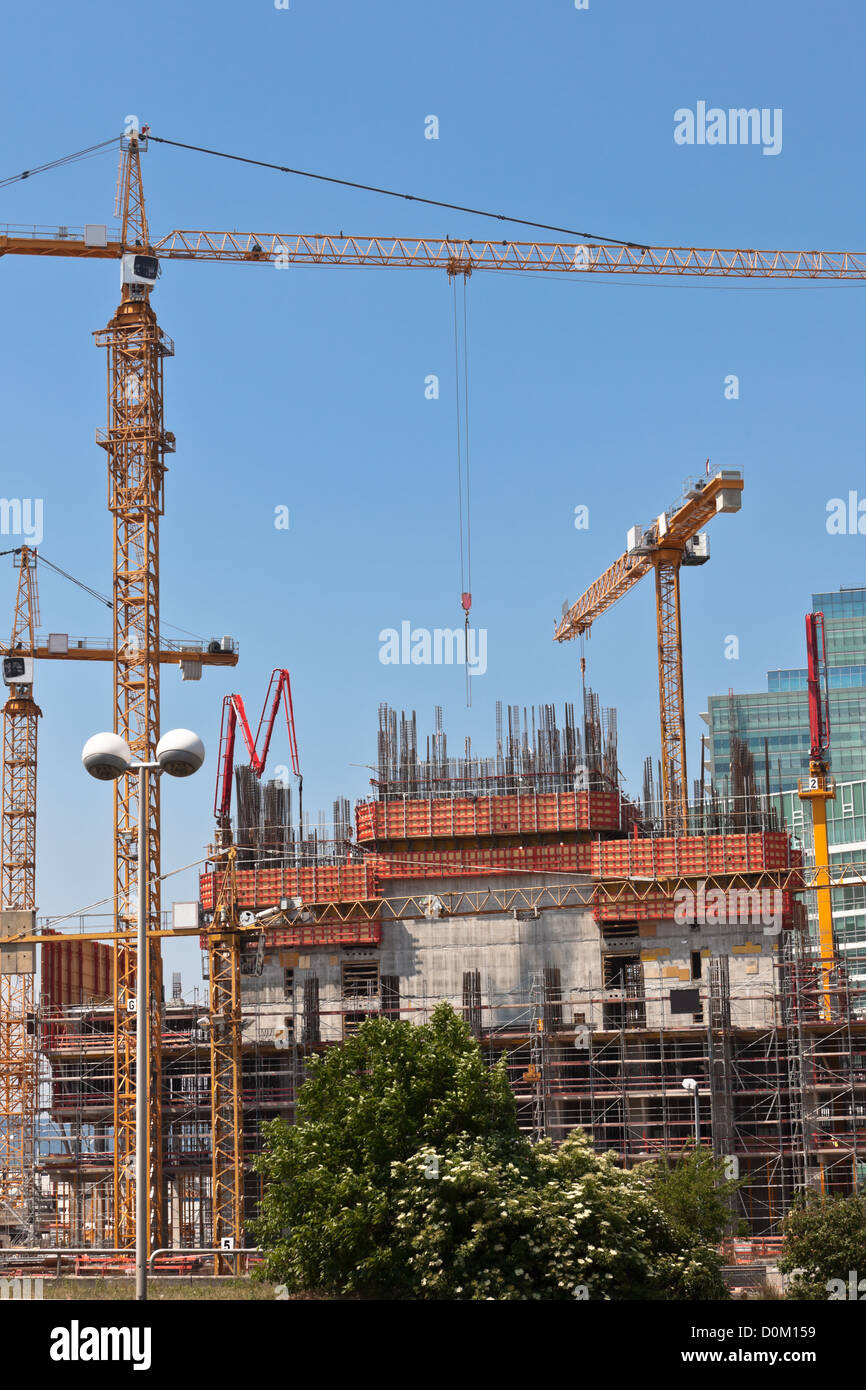 Modern Office Building Construction Site. Vertical shot Stock Photo - Alamy