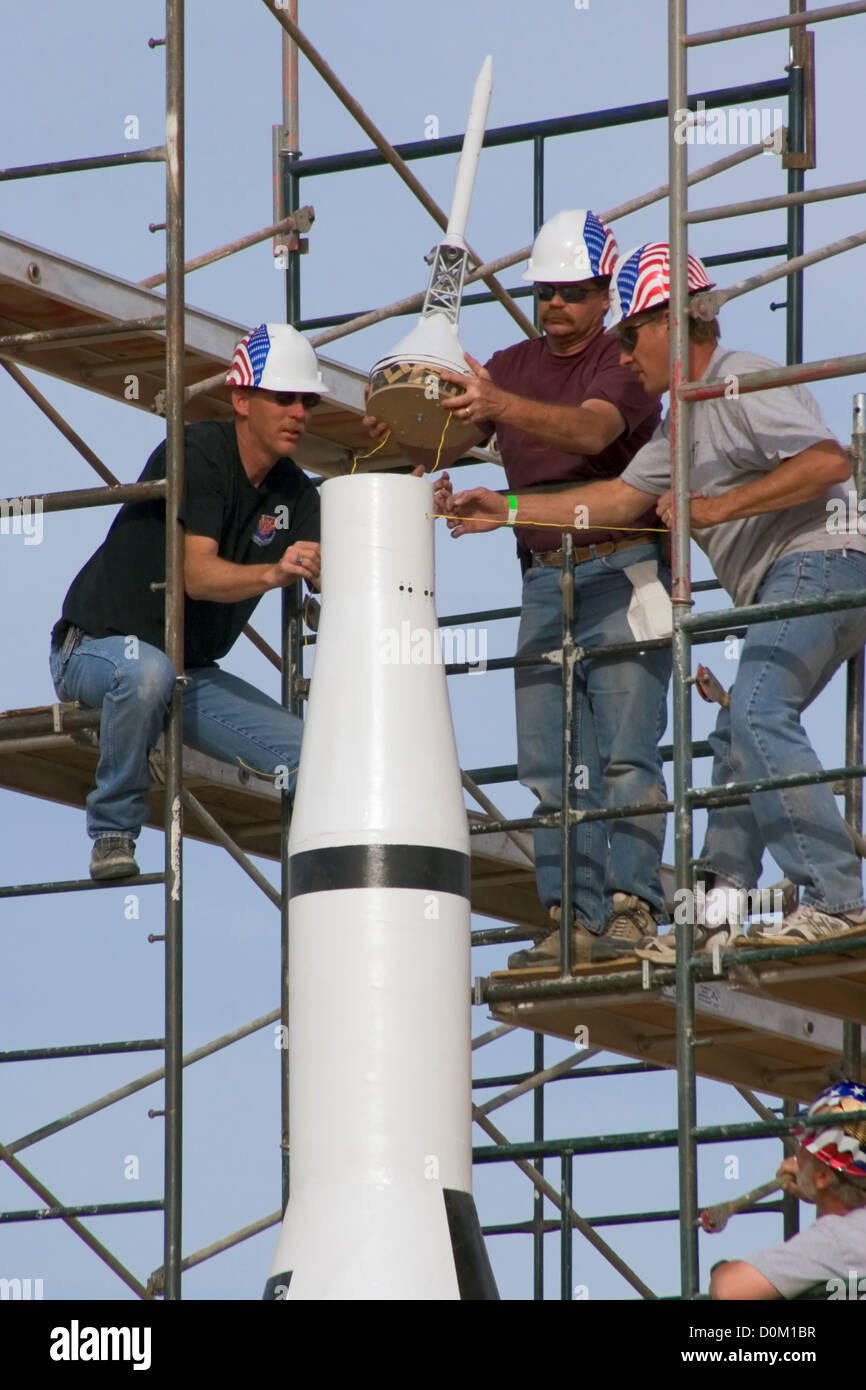 Placing 'Command Module' on Model Saturn V Stock Photo - Alamy