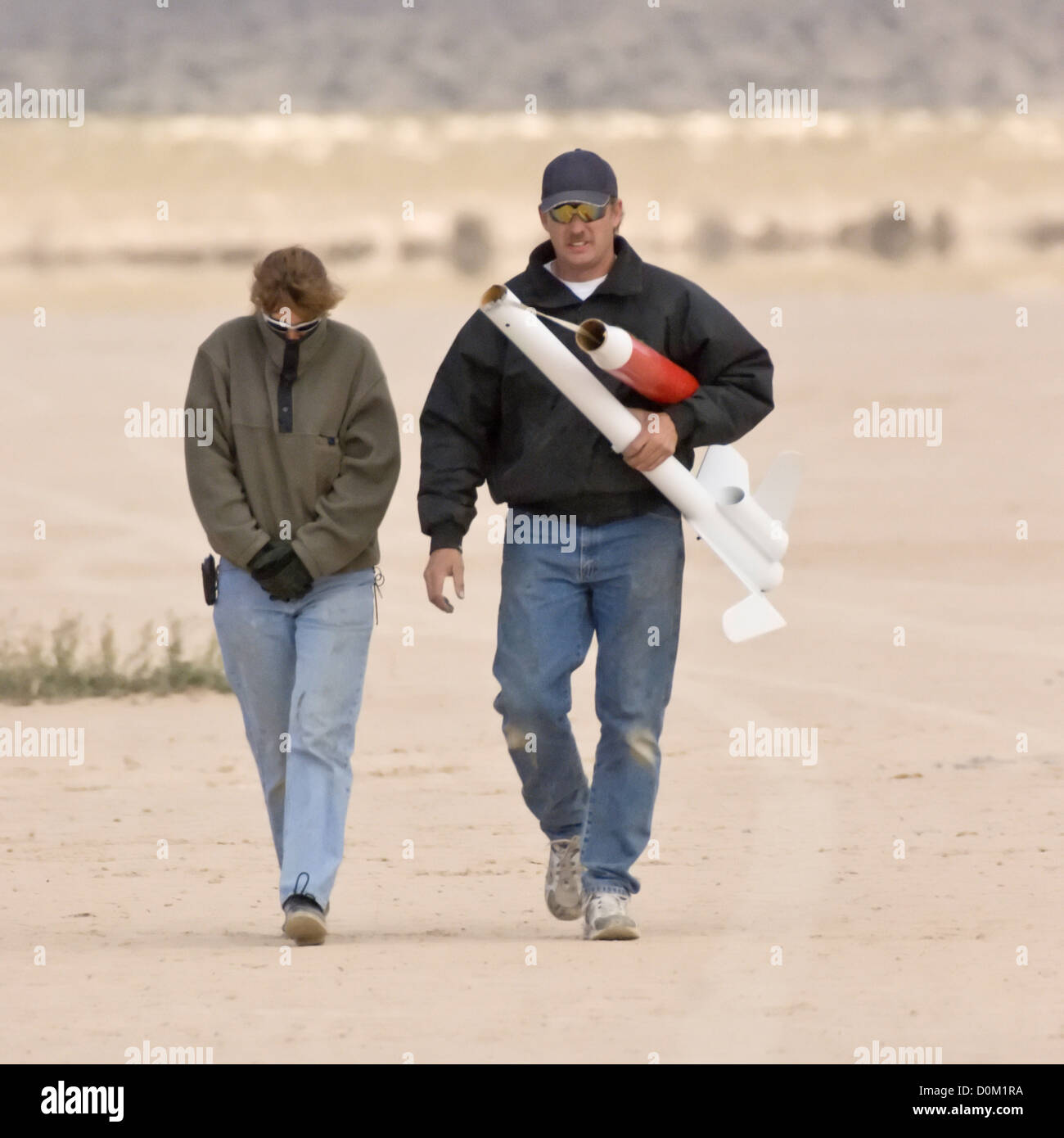 Larry Foster recovers one of his rockets after a launch at Jean Dry ...
