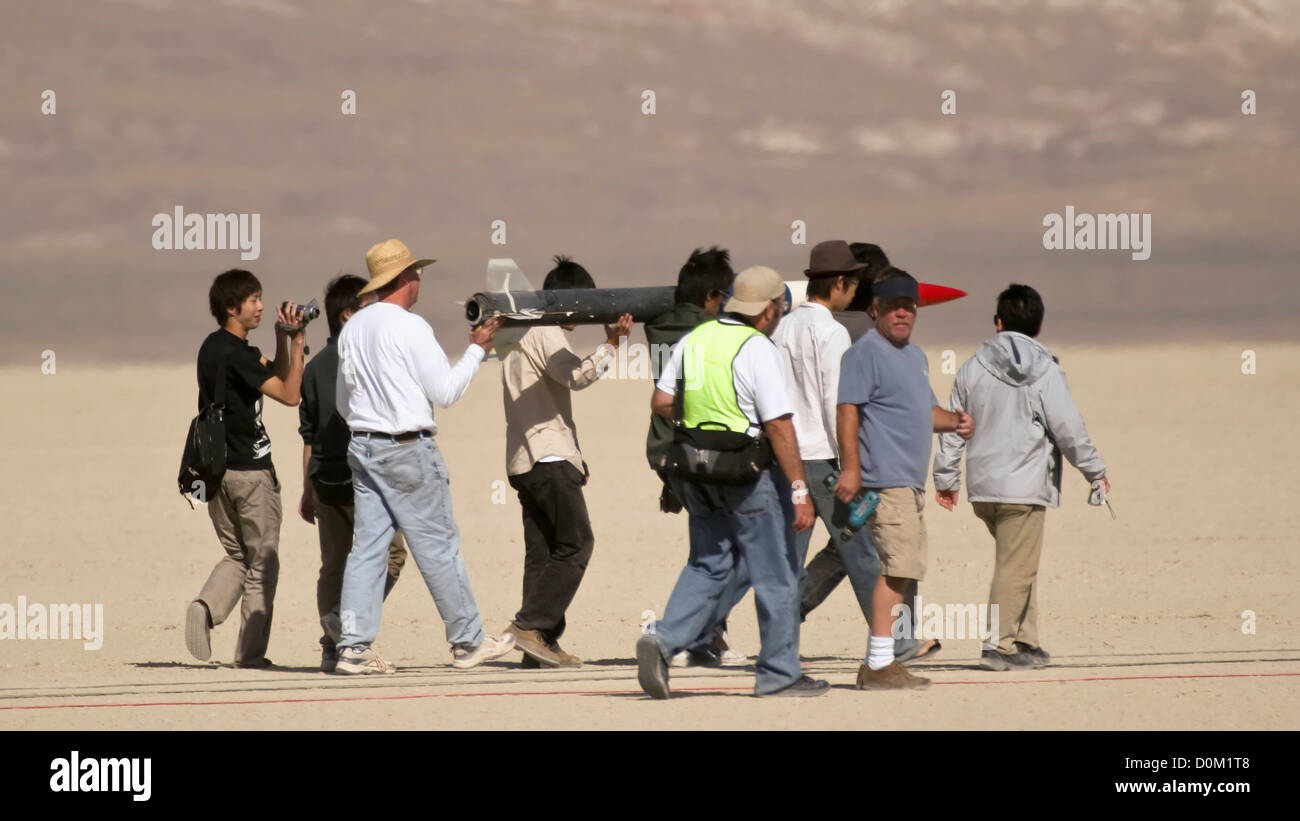 A group people carry rocket out launch site Rocket Launch International ...