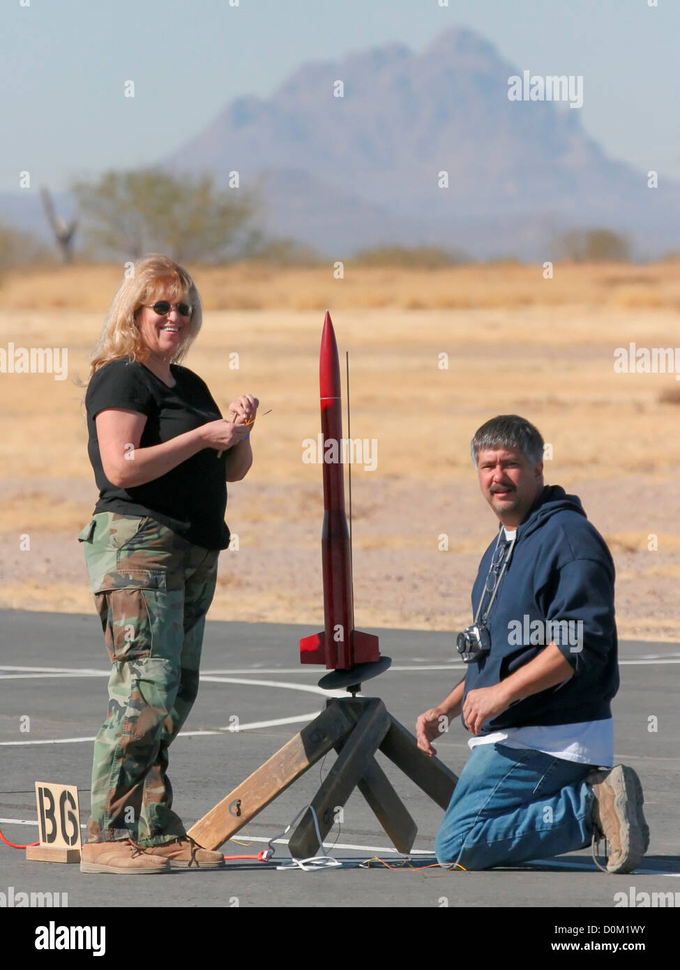 Larry Sue Johnson prepare red rocket launch on launch pad launch event ...