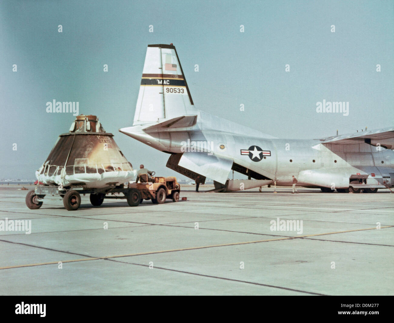 A Military Airlift Command C-130 aircraft prepares load flown AS201 ...