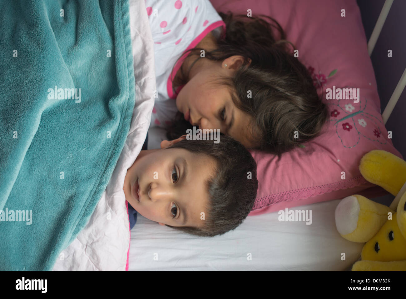 Kids sleeping together Stock Photo - Alamy