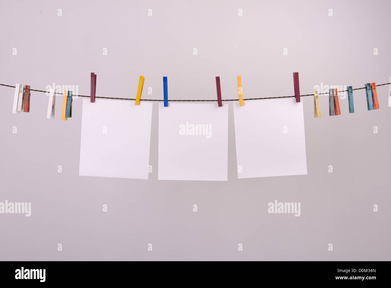 To put the white sheets on the line Stock Photo - Alamy