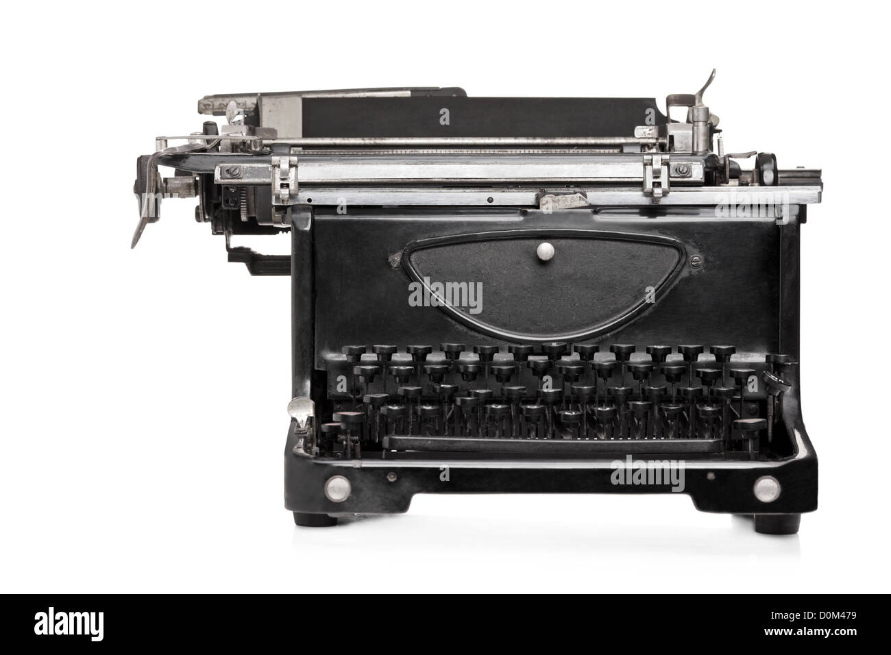 Studio shot of an old style typing machine isolated against white ...