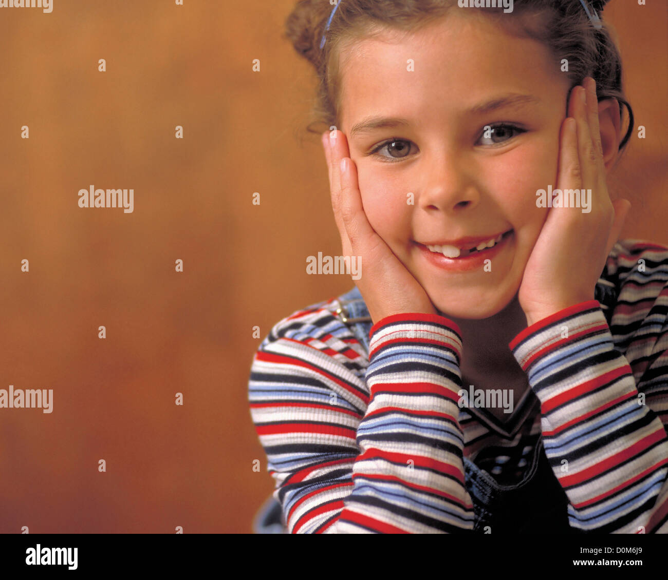 Portrait of Smiling Young Girl with Missing Tooth Stock Photo - Alamy