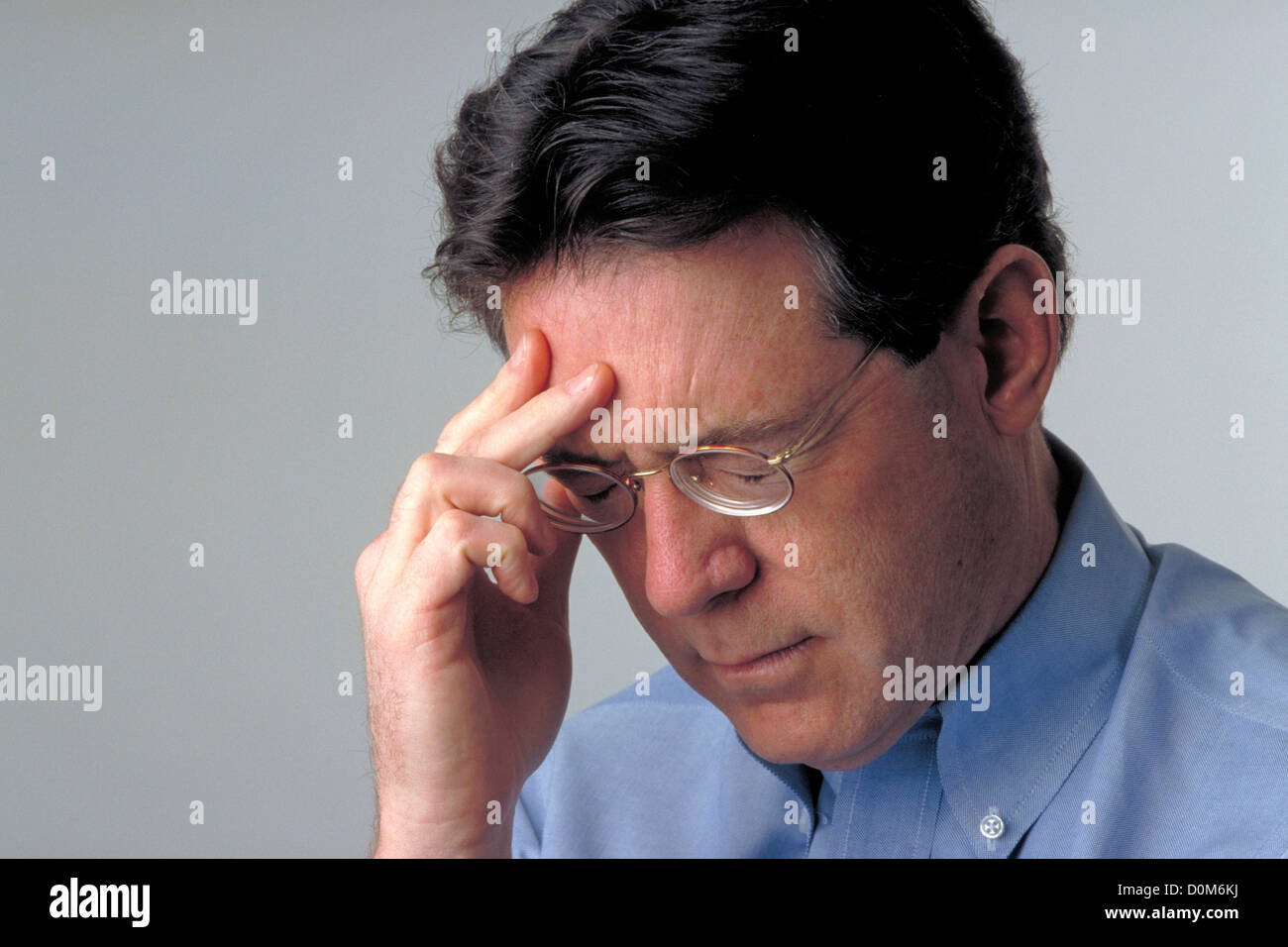 Man with Headache Stock Photo - Alamy