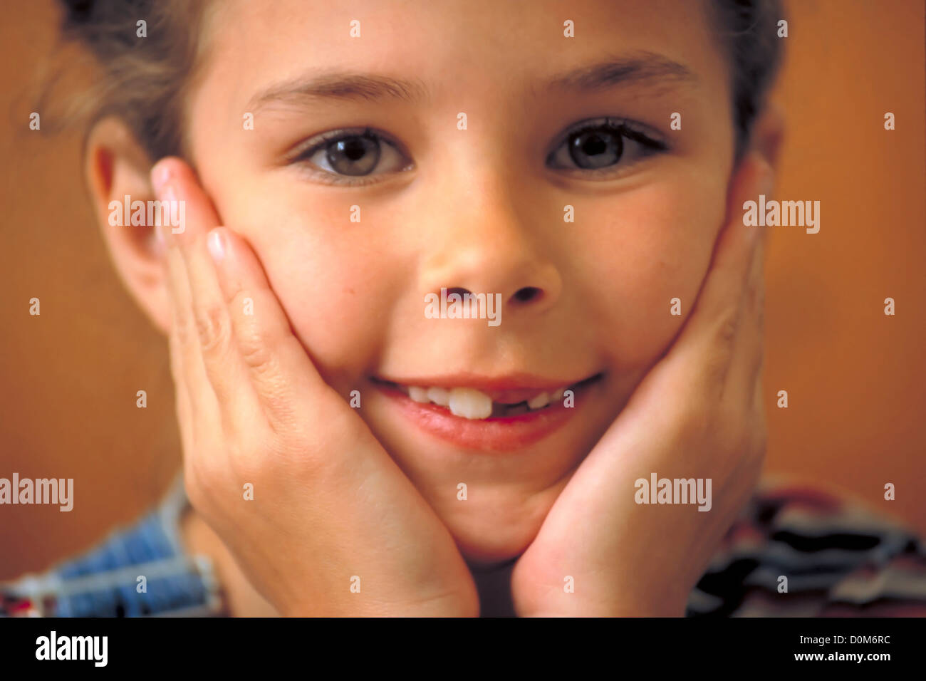 Portrait of Smiling Young Girl with Missing Tooth Stock Photo - Alamy