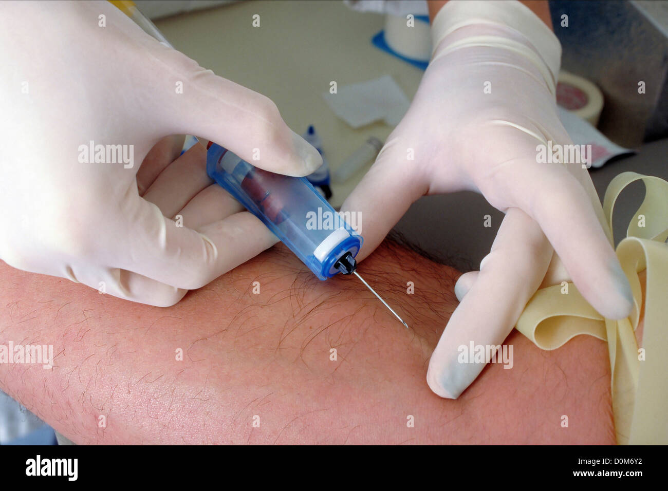 Phlebotomist Draws Blood from the Arm of a Patient Stock Photo - Alamy