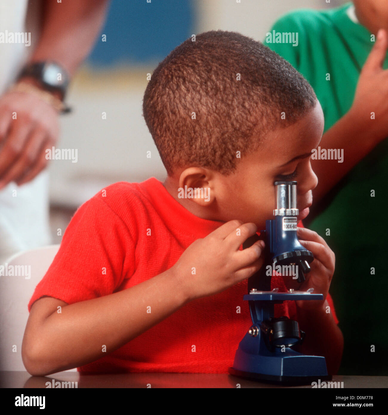 Child Looking into Microscope Stock Photo - Alamy