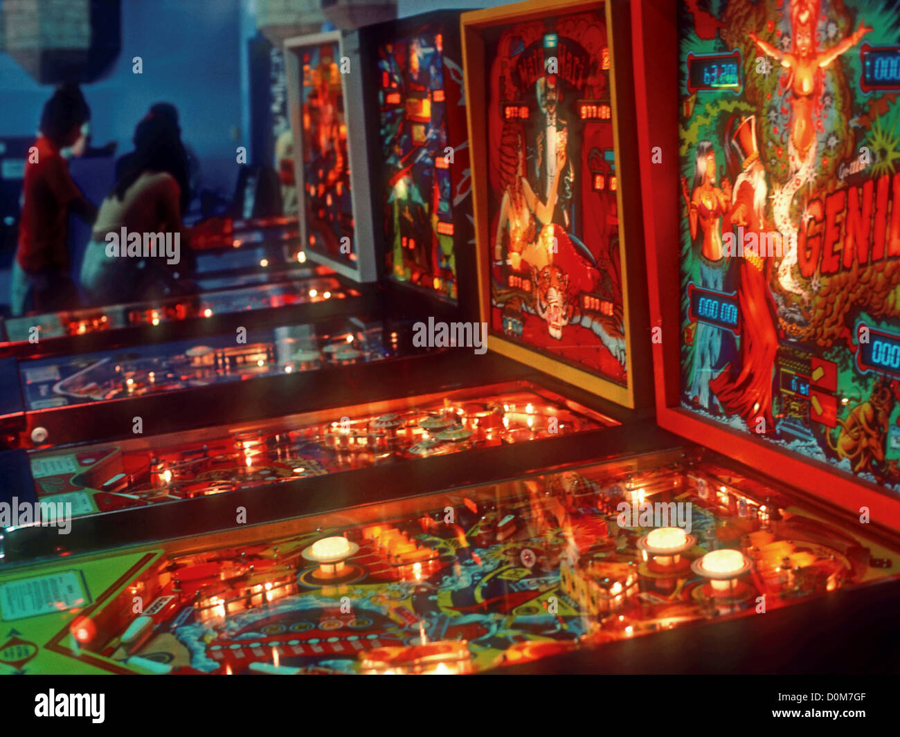 Rows Of Glowing Pinball Machines Stock Photo - Alamy