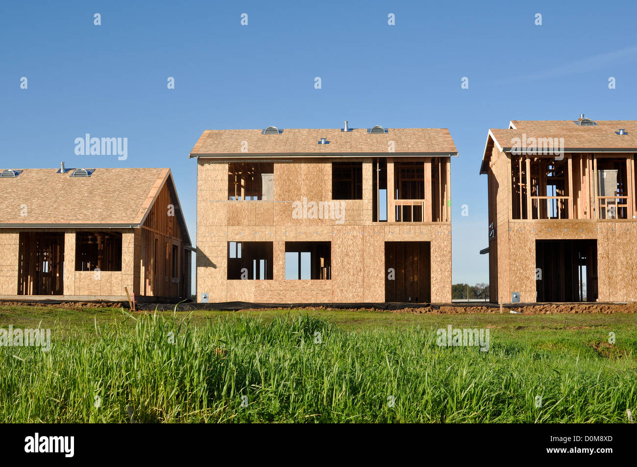 Three homes hi-res stock photography and images - Alamy