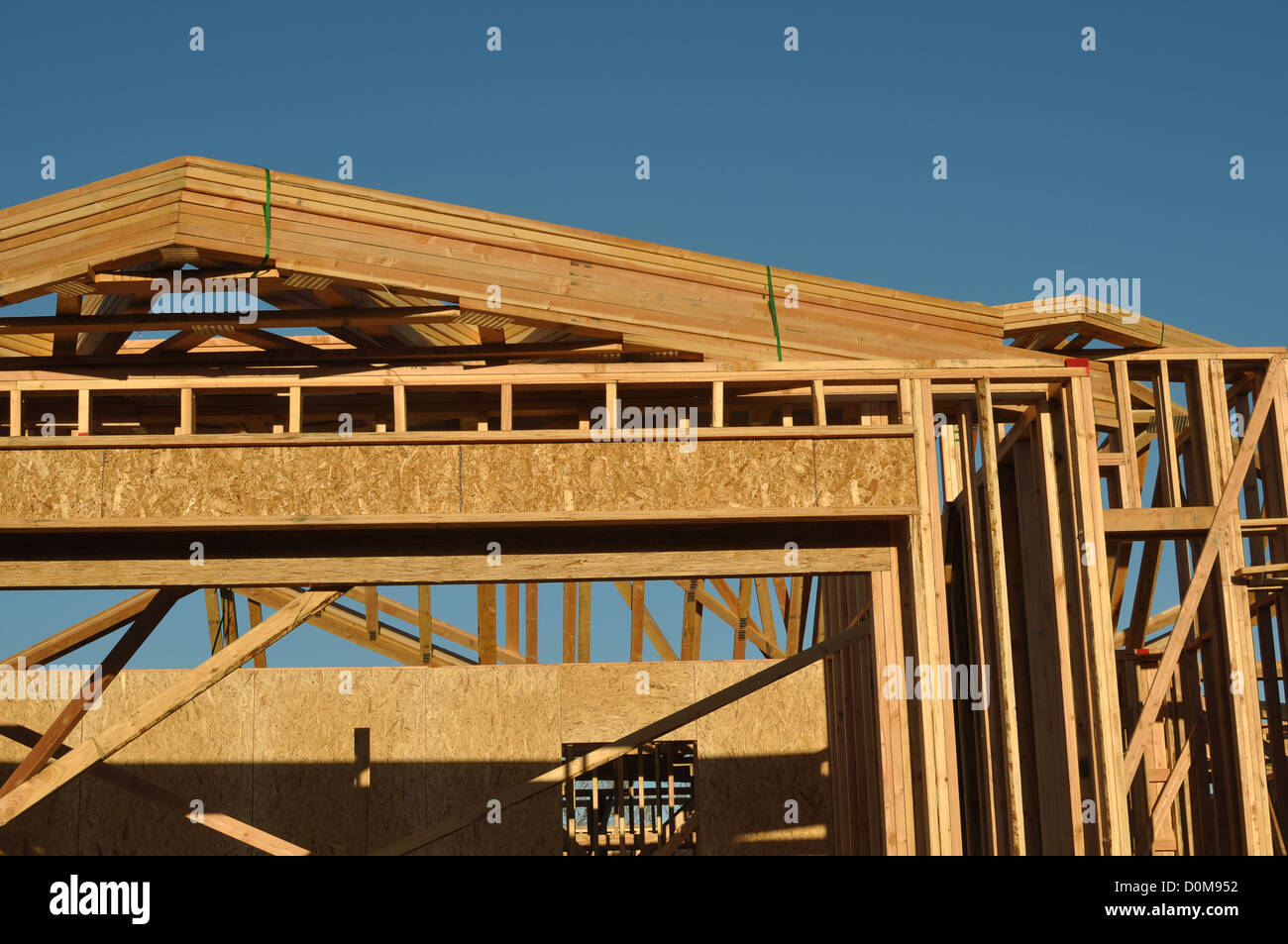New Home Construction Frame with Blue Sky Stock Photo - Alamy