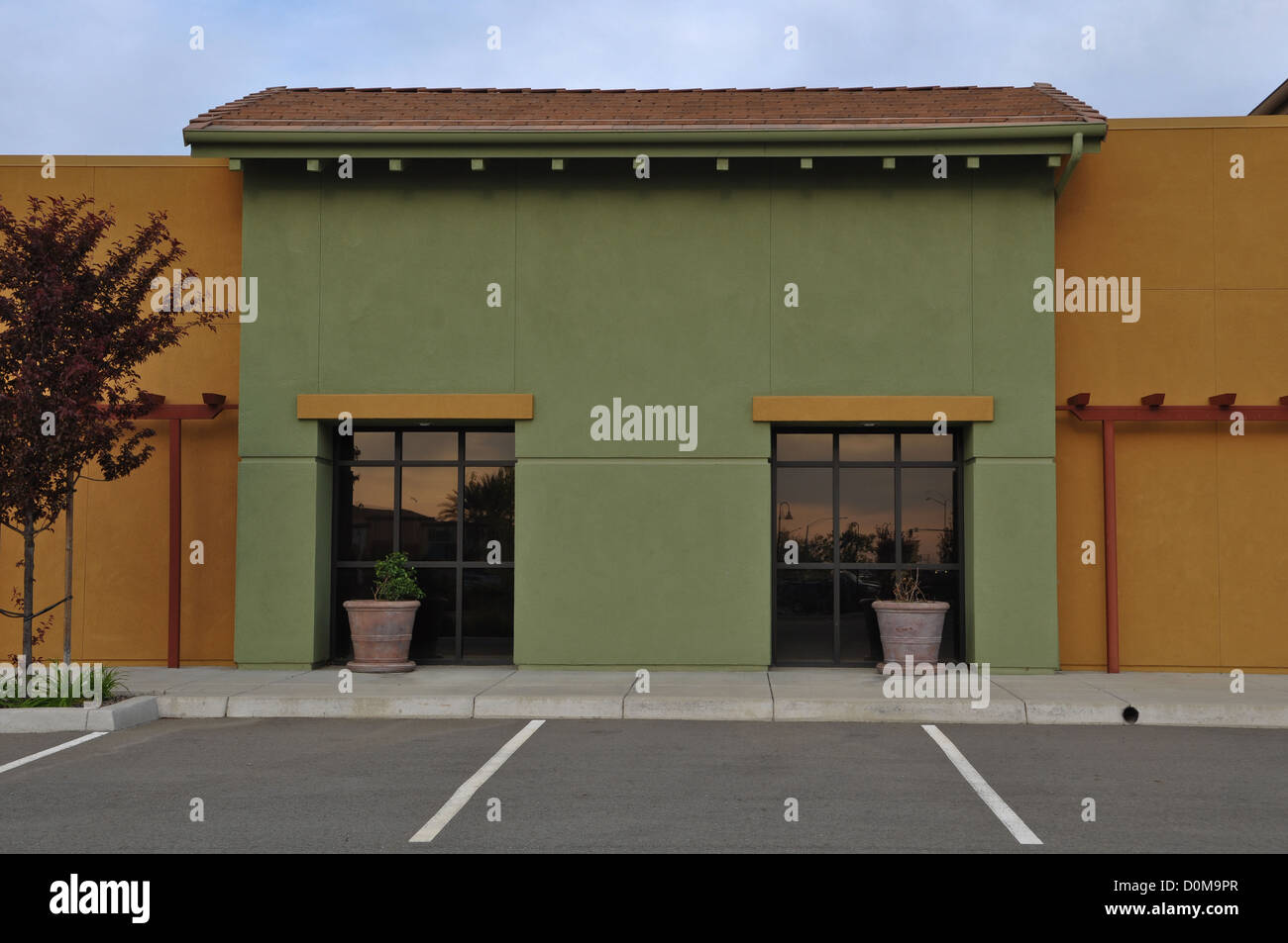 New Green and Yellow Shopping Center Store Front Stock Photo - Alamy