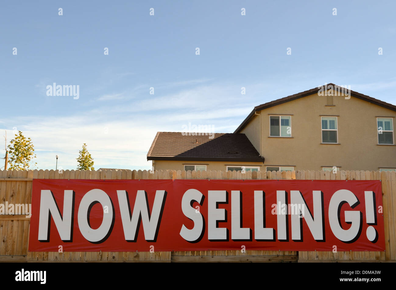 Now Selling Homes Sign Stock Photo - Alamy