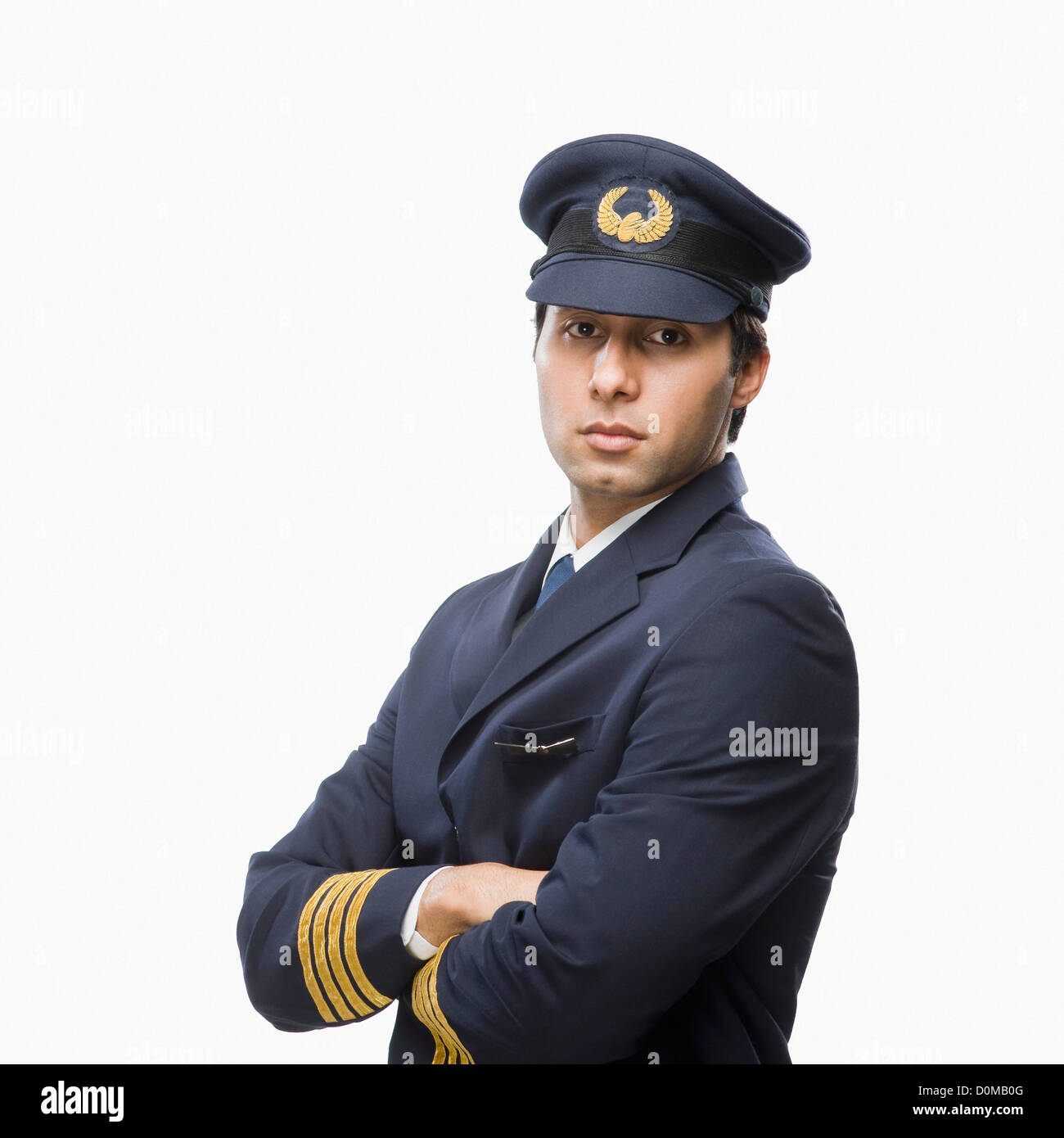 Portrait of a pilot with his arms crossed Stock Photo - Alamy