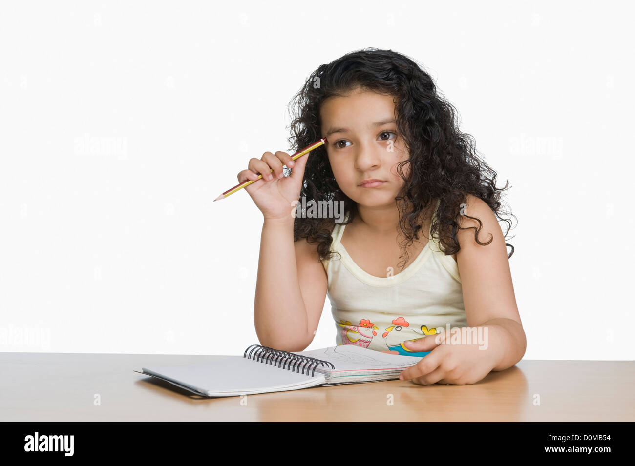 Close-up of a girl thinking Stock Photo - Alamy