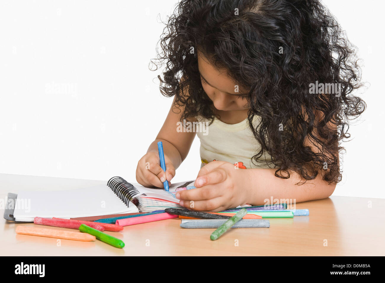 Close-up of a girl drawing a picture with crayons Stock Photo - Alamy