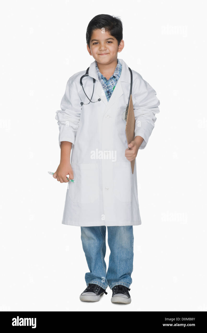 Boy smiling in a lab coat Stock Photo - Alamy