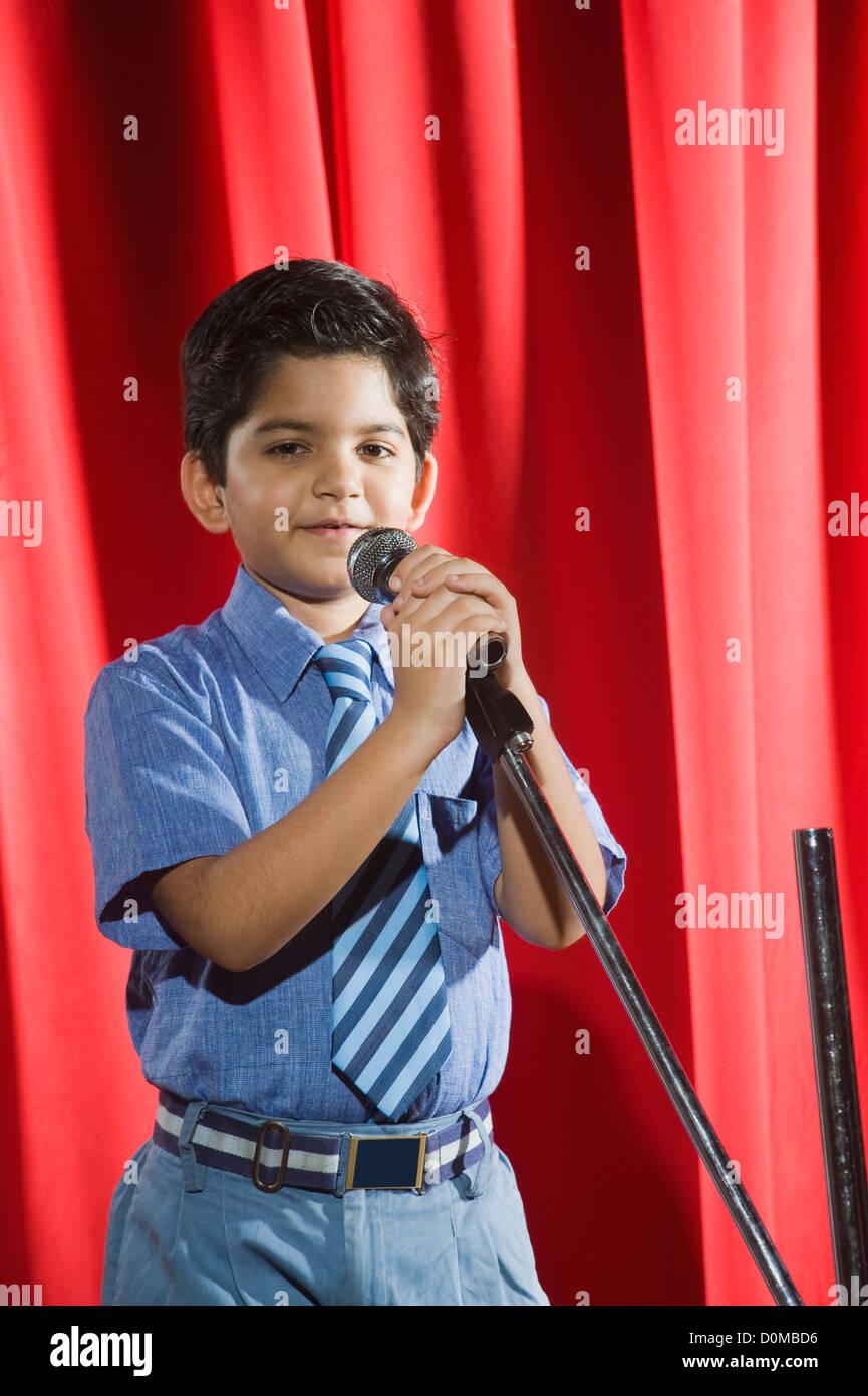 Indian boy singing microphone hi-res stock photography and images - Alamy